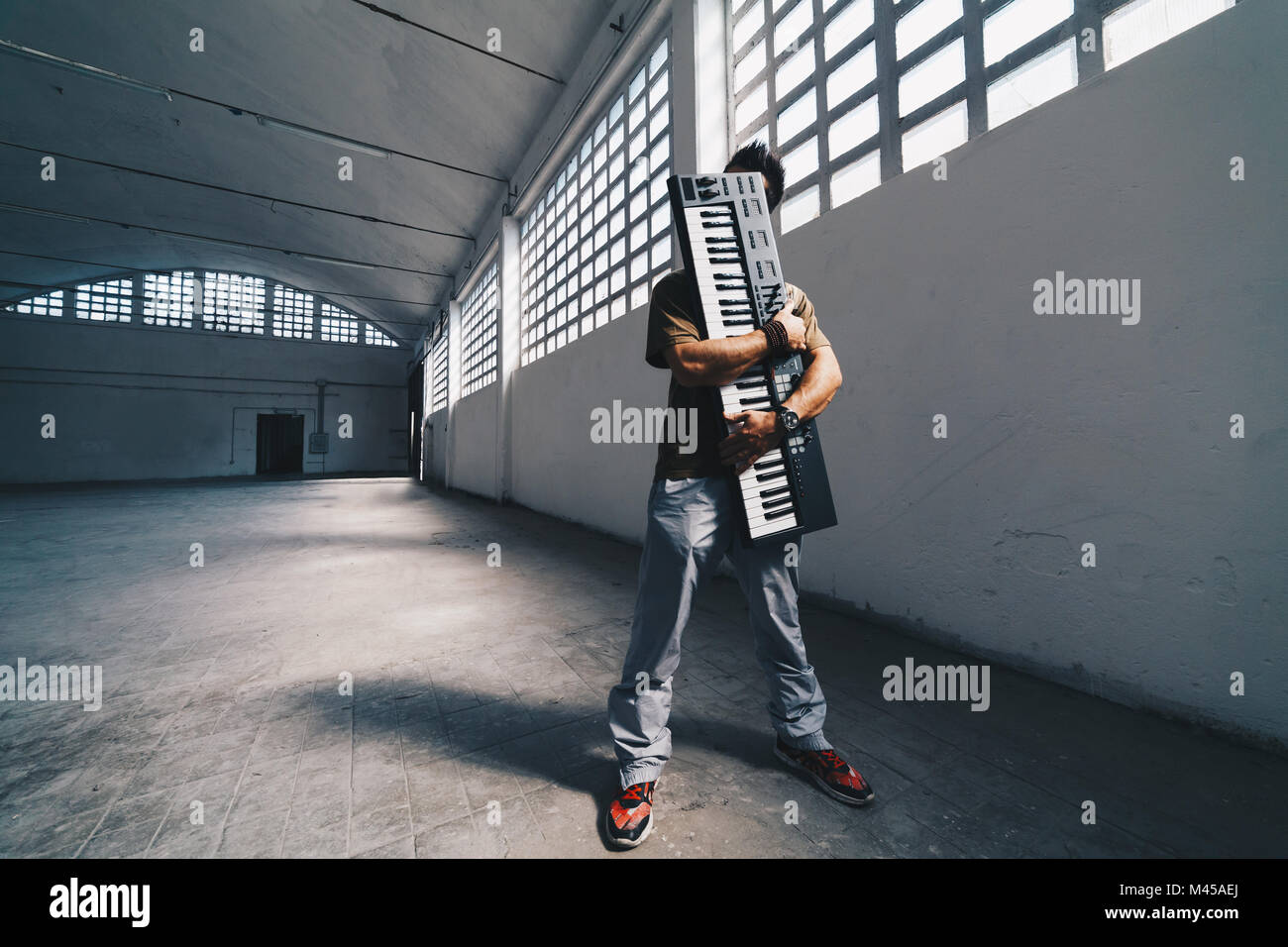 Musician Concept artist keeping his keyboard and showing his love for ...