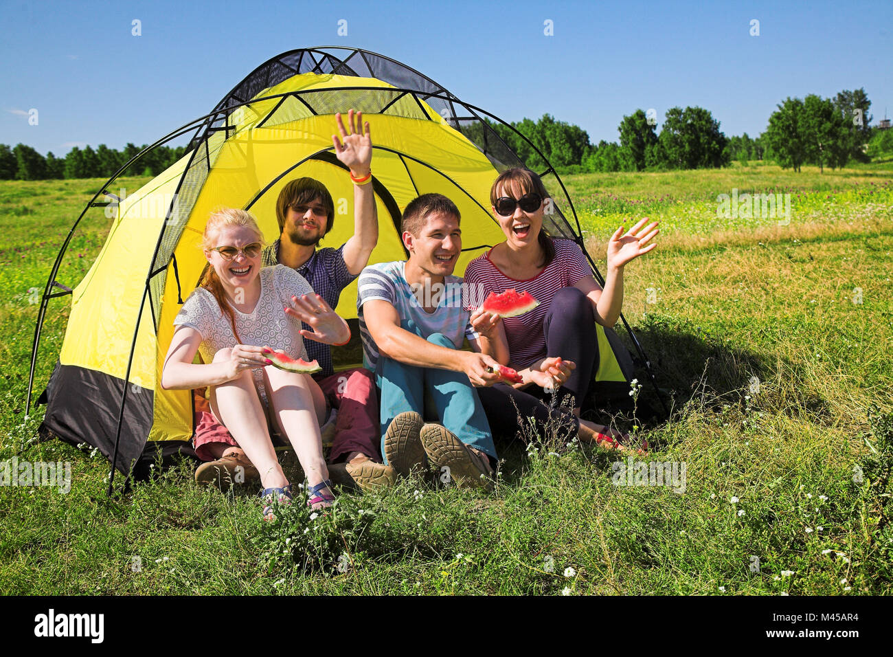 people relaxing in the tent Stock Photo - Alamy
