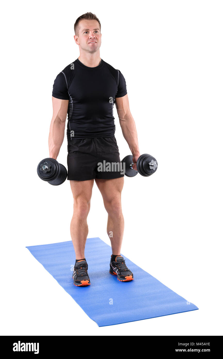 young man shows starting position of biceps curl Stock Photo - Alamy