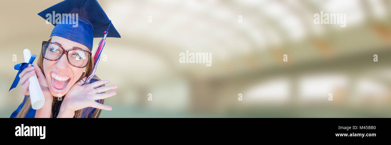 Goofy Graduating Young Girl In Cap and Gown Banner Stock Photo - Alamy