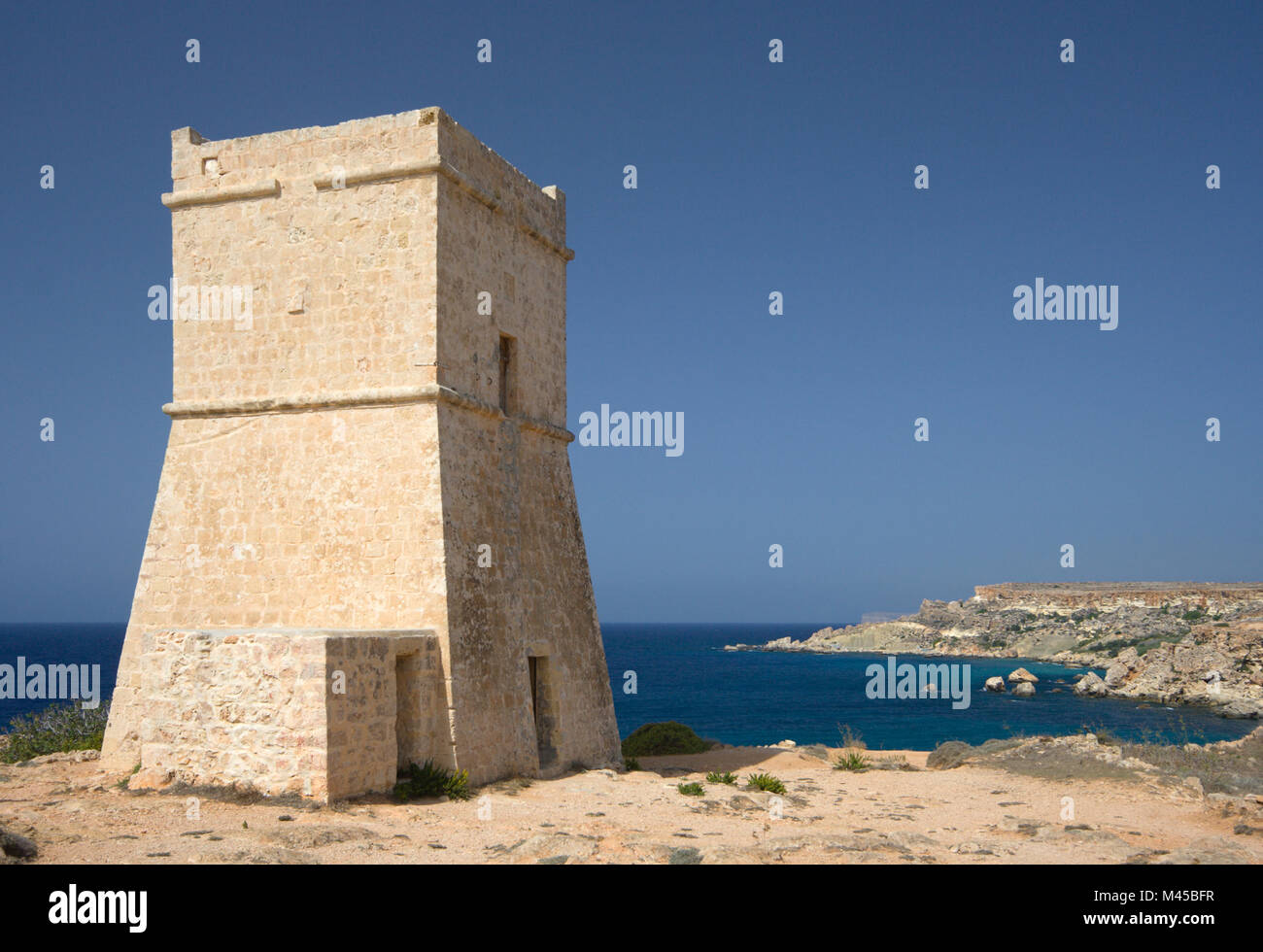 One of the many watch towers at the coastline of Malta Stock Photo - Alamy