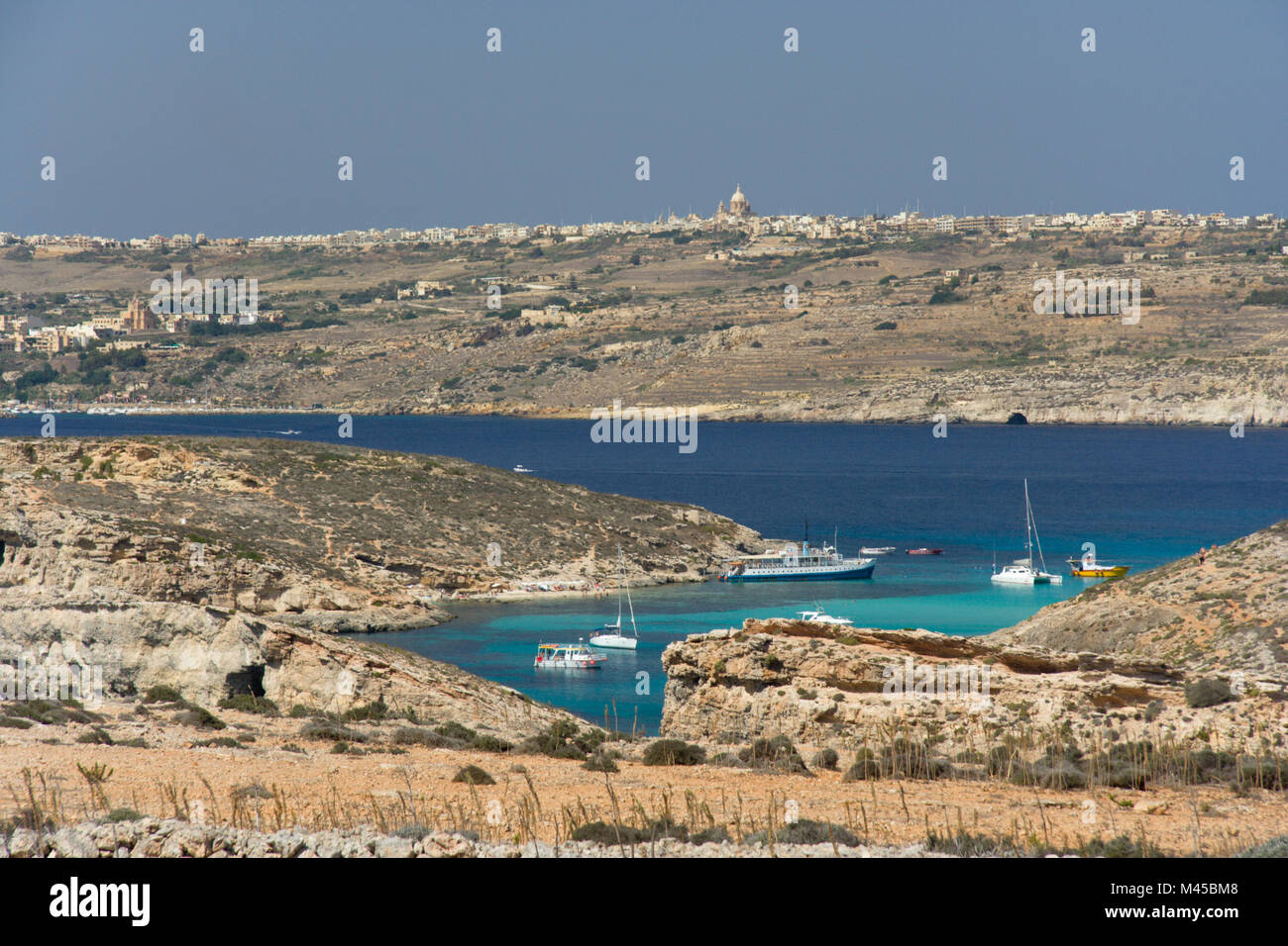 View to the Blue Lagoon with the island of Gozo in the background Stock ...