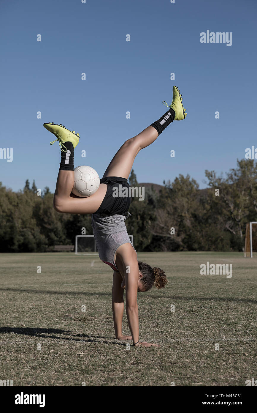 Balancing football on leg hi-res stock photography and images - Alamy