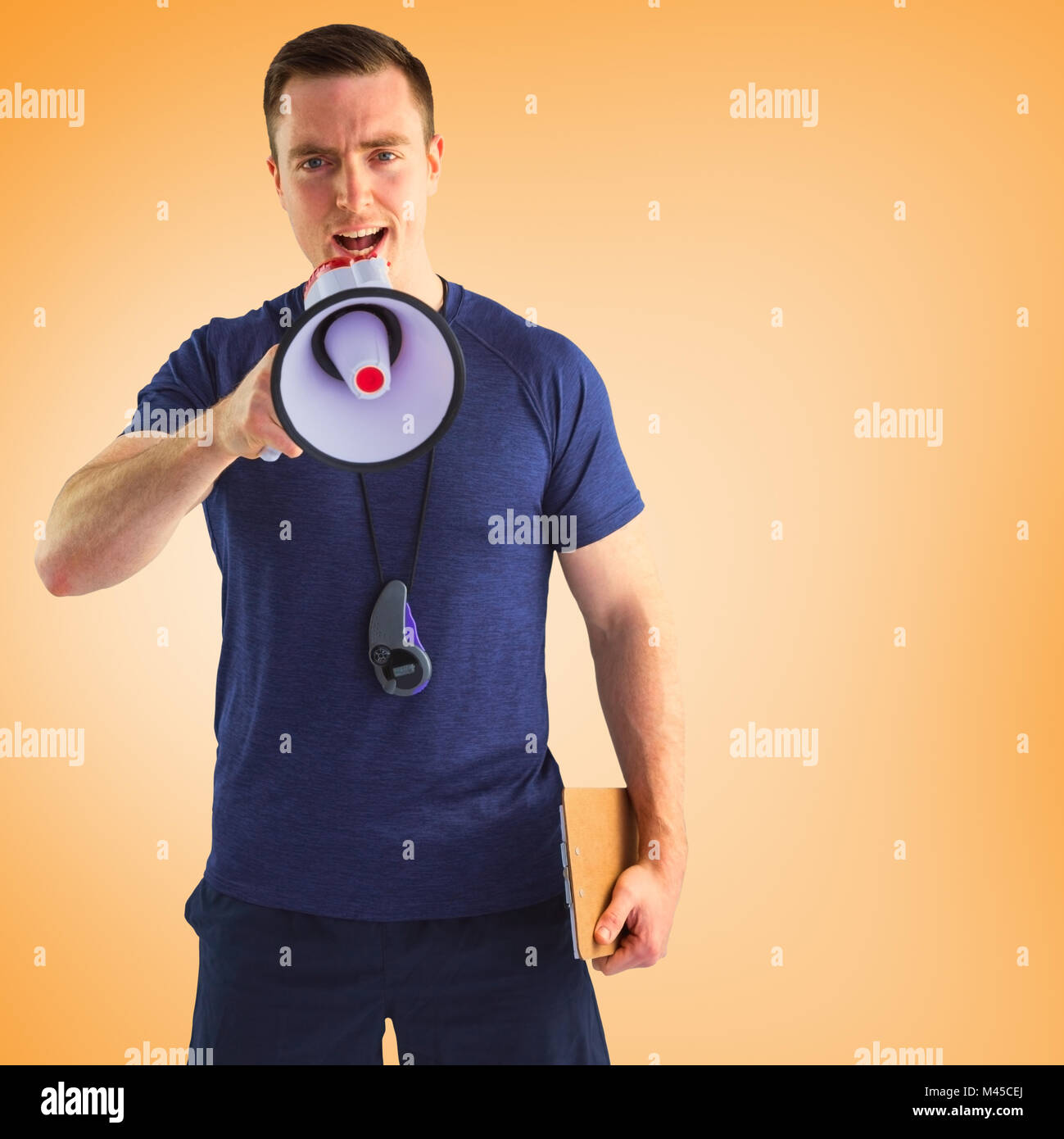 Composite image of attentive trainer looking at the camera Stock Photo ...