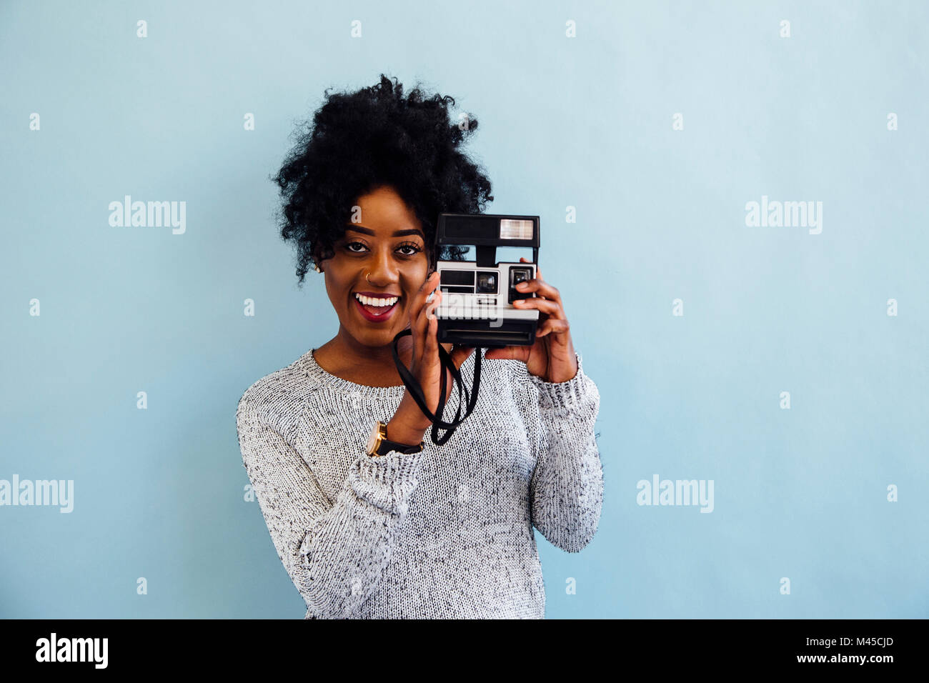 Smiling photographer looking camera hi-res stock photography and images ...