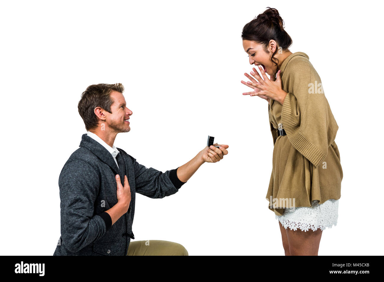Man proposing ring surprised partner hi-res stock photography and ...