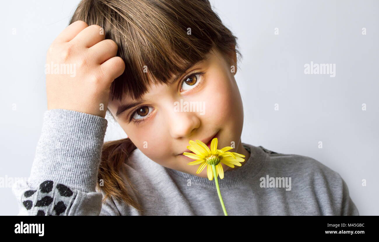 Baby smelling flower hi-res stock photography and images - Alamy