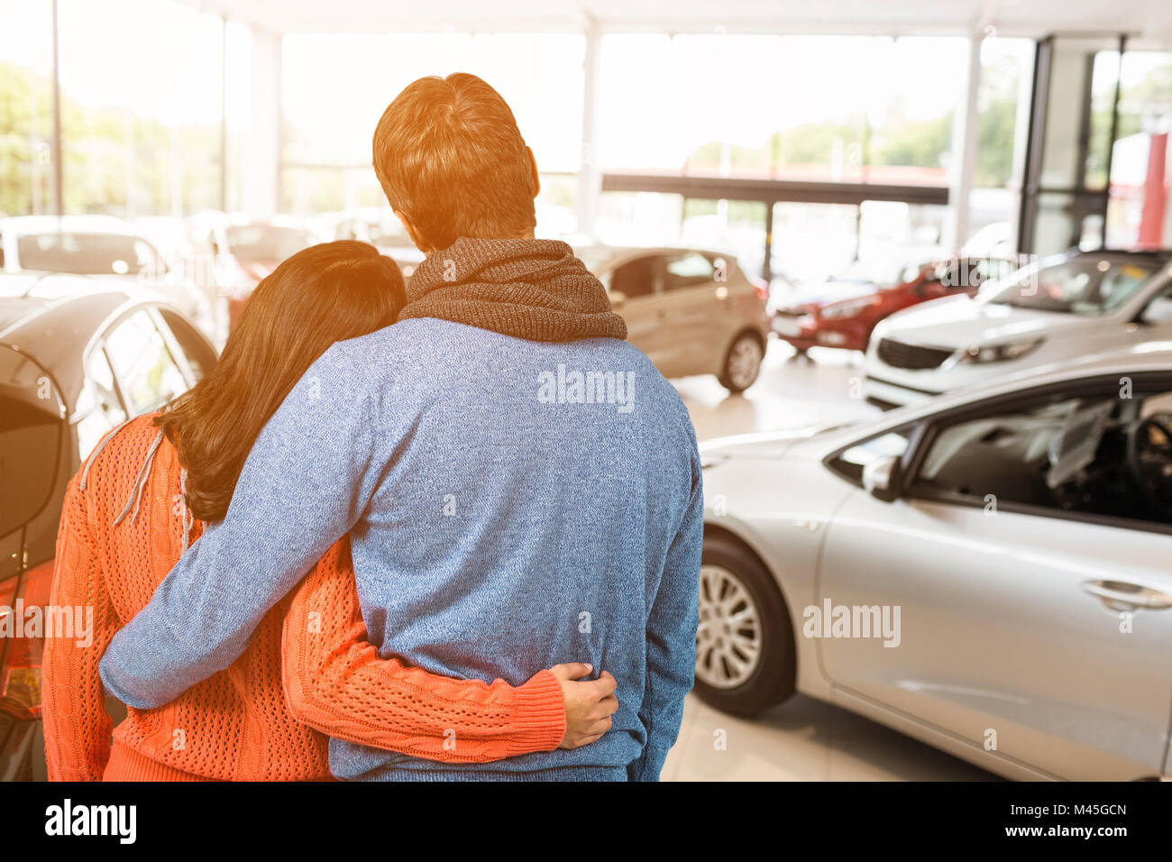 Composite image of rear view of couple against white background Stock ...