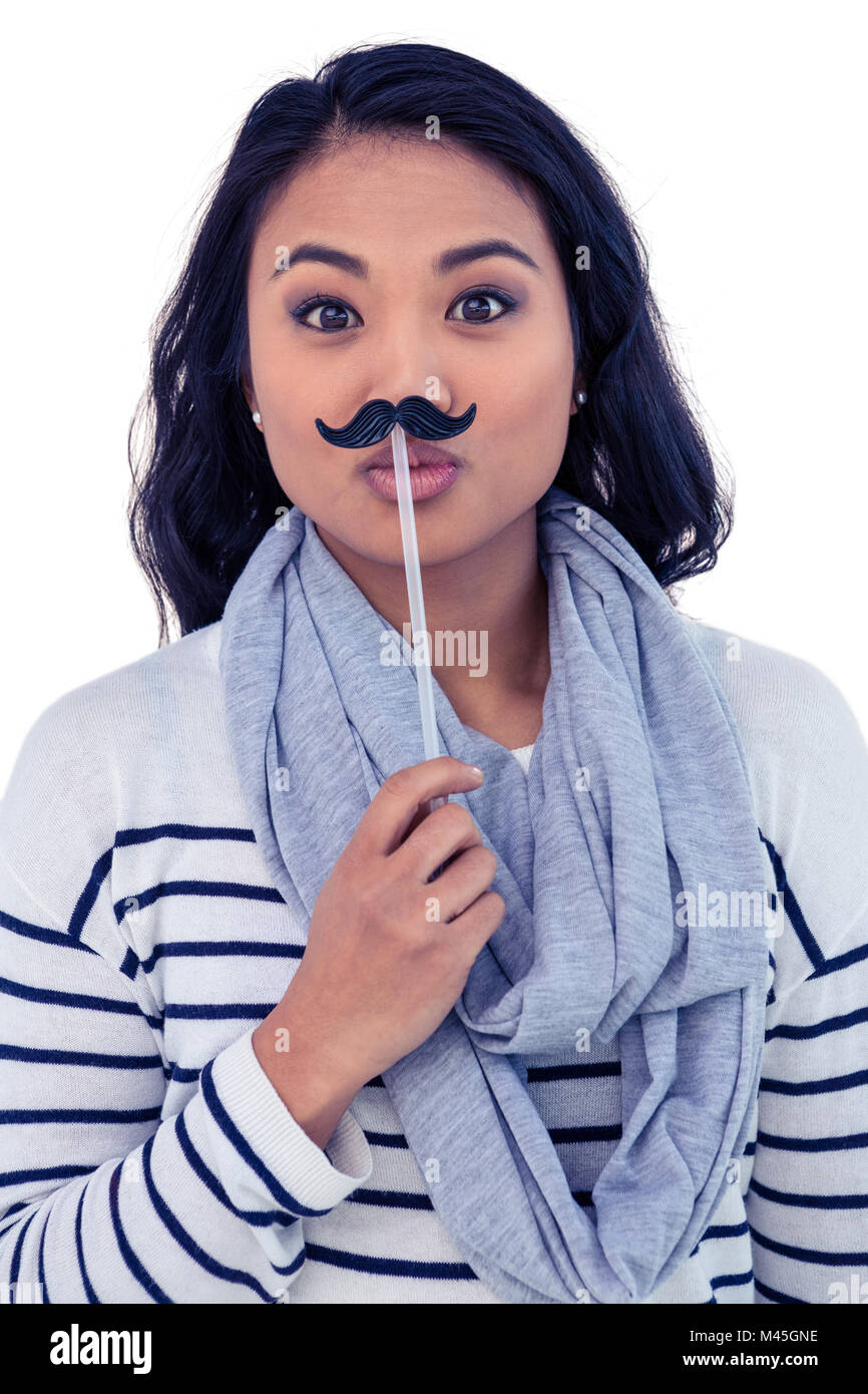 Pretty Asian woman with fake mustache posing for camera Stock Photo - Alamy