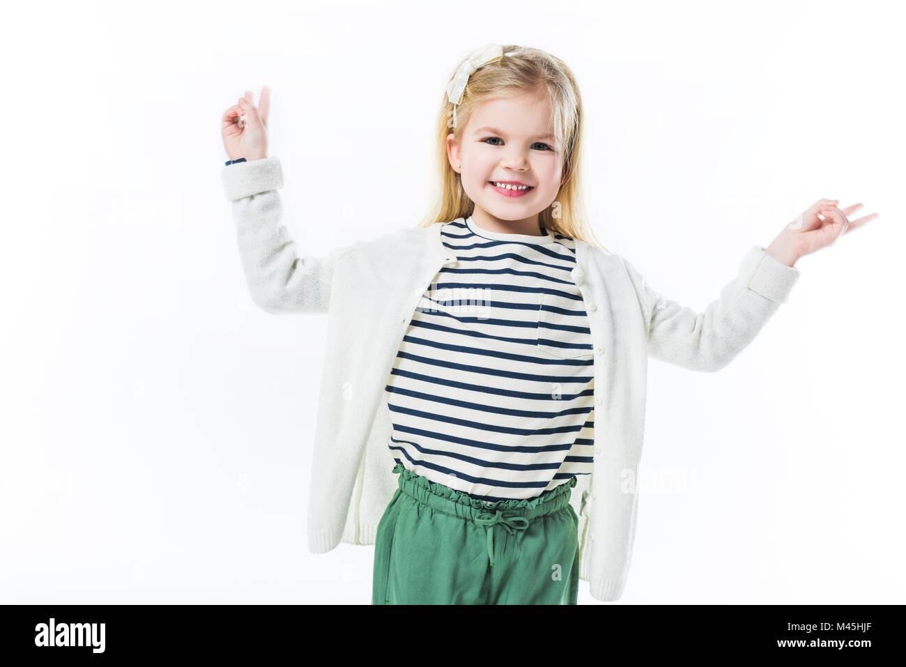 happy little child showing peace gestures isolated on white Stock Photo ...