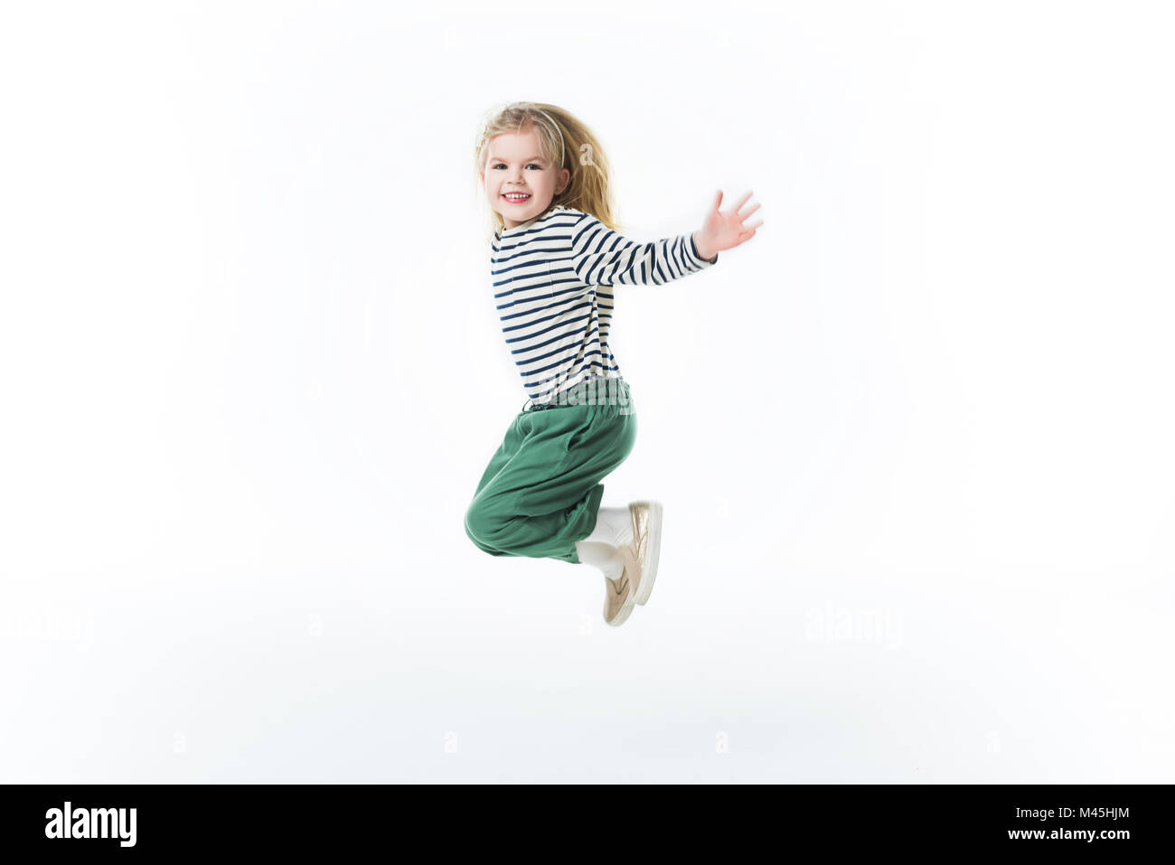 action shot of little child jumping isolated on white Stock Photo - Alamy