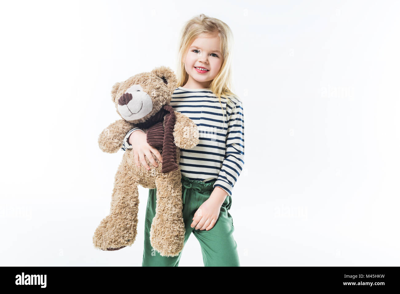 adorable little child with teddy bear isolated on white Stock Photo - Alamy