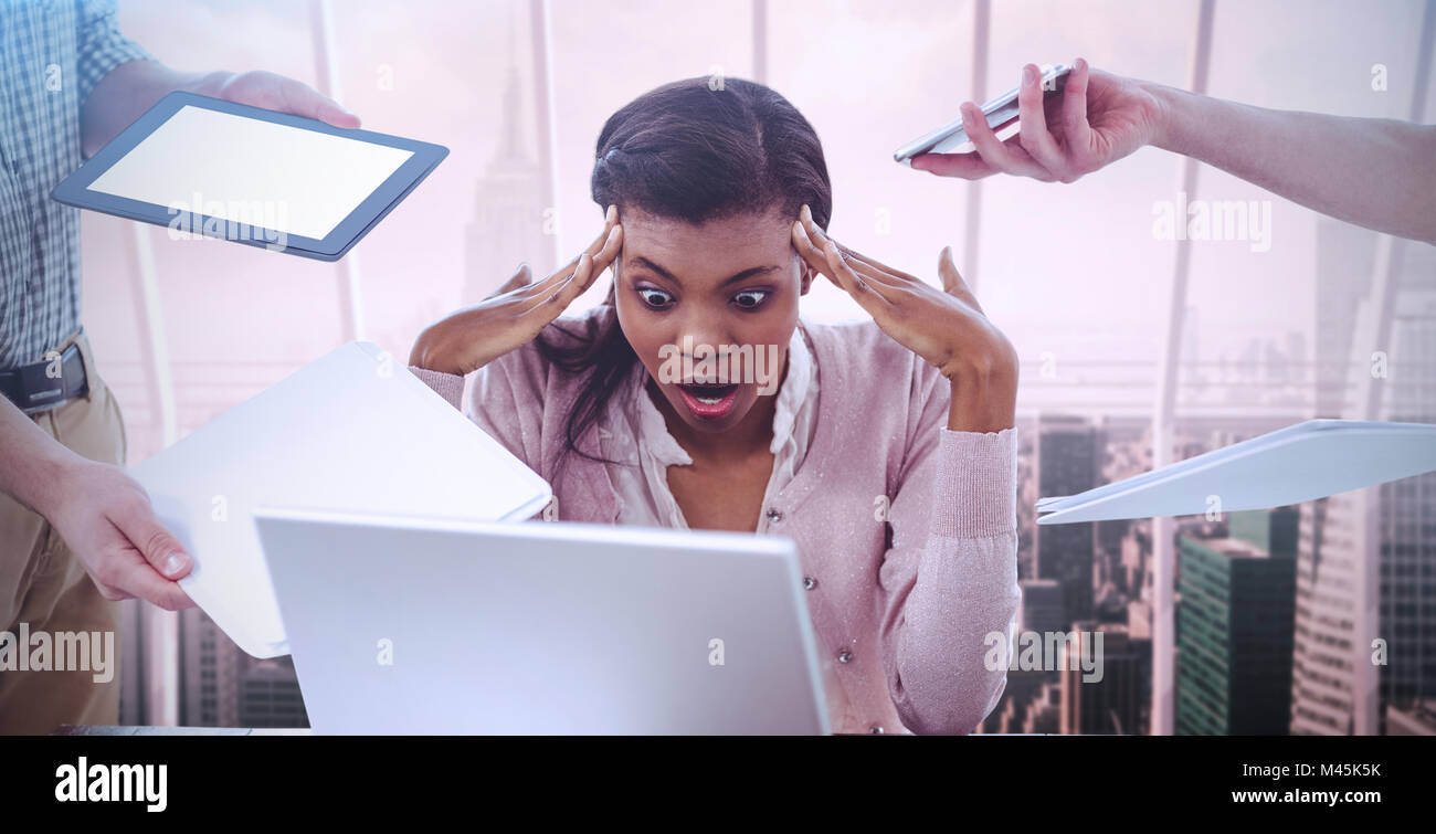 Composite image of businesswoman stressed out at work Stock Photo - Alamy