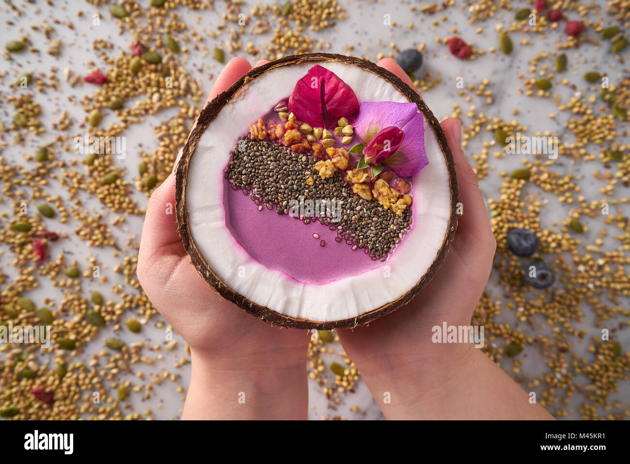 Acai bowl smoothie inside coconut chia granola blueberry and pitaya ...