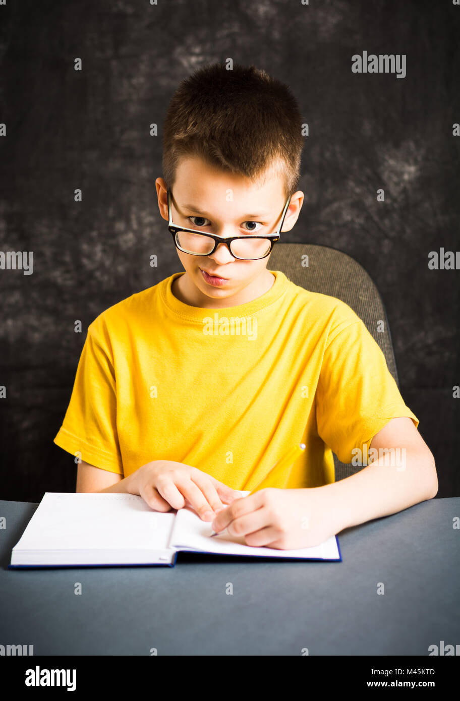 Boy studying desk hi-res stock photography and images - Alamy