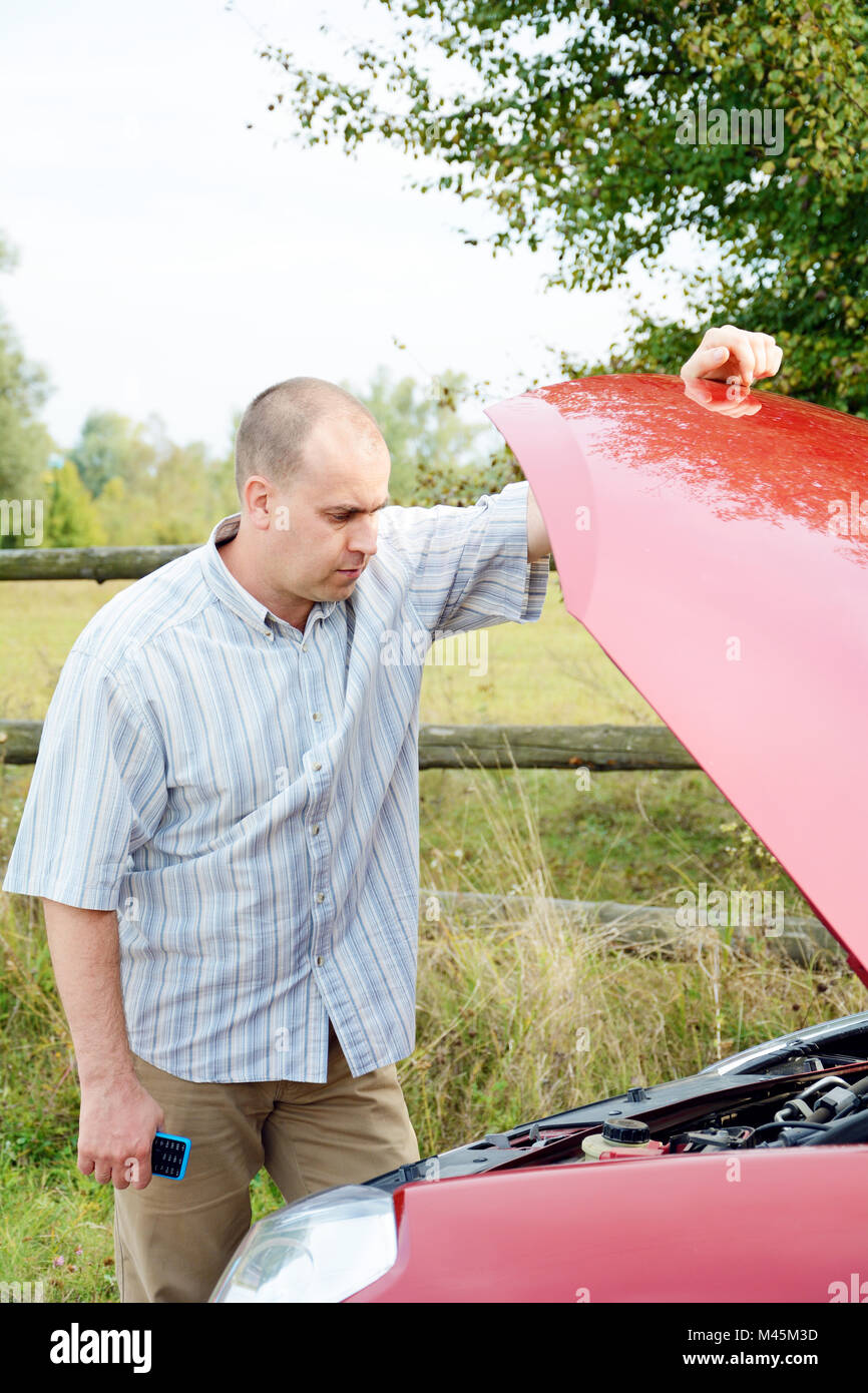Standing near car hi-res stock photography and images - Alamy