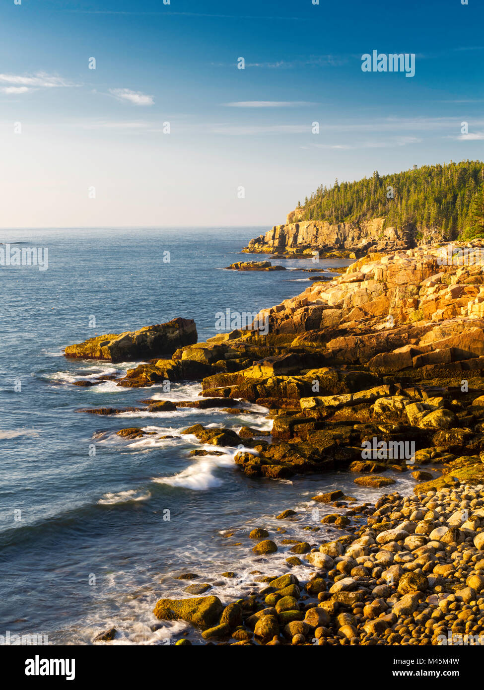 Morning view over Monument Cove and Otter Point, along the coast of ...