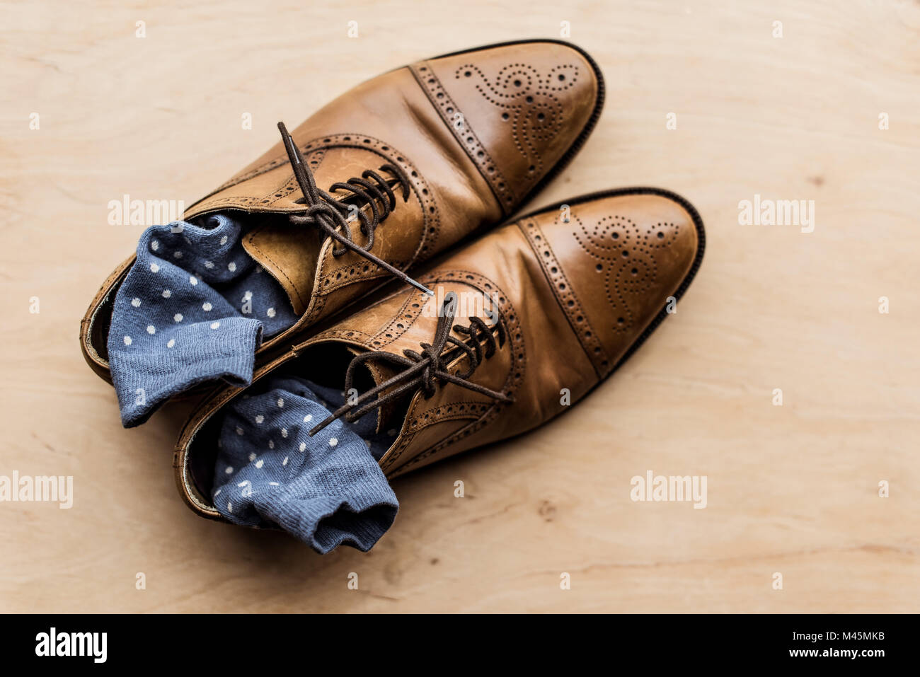top view of brown male shoes with socks inside Stock Photo - Alamy