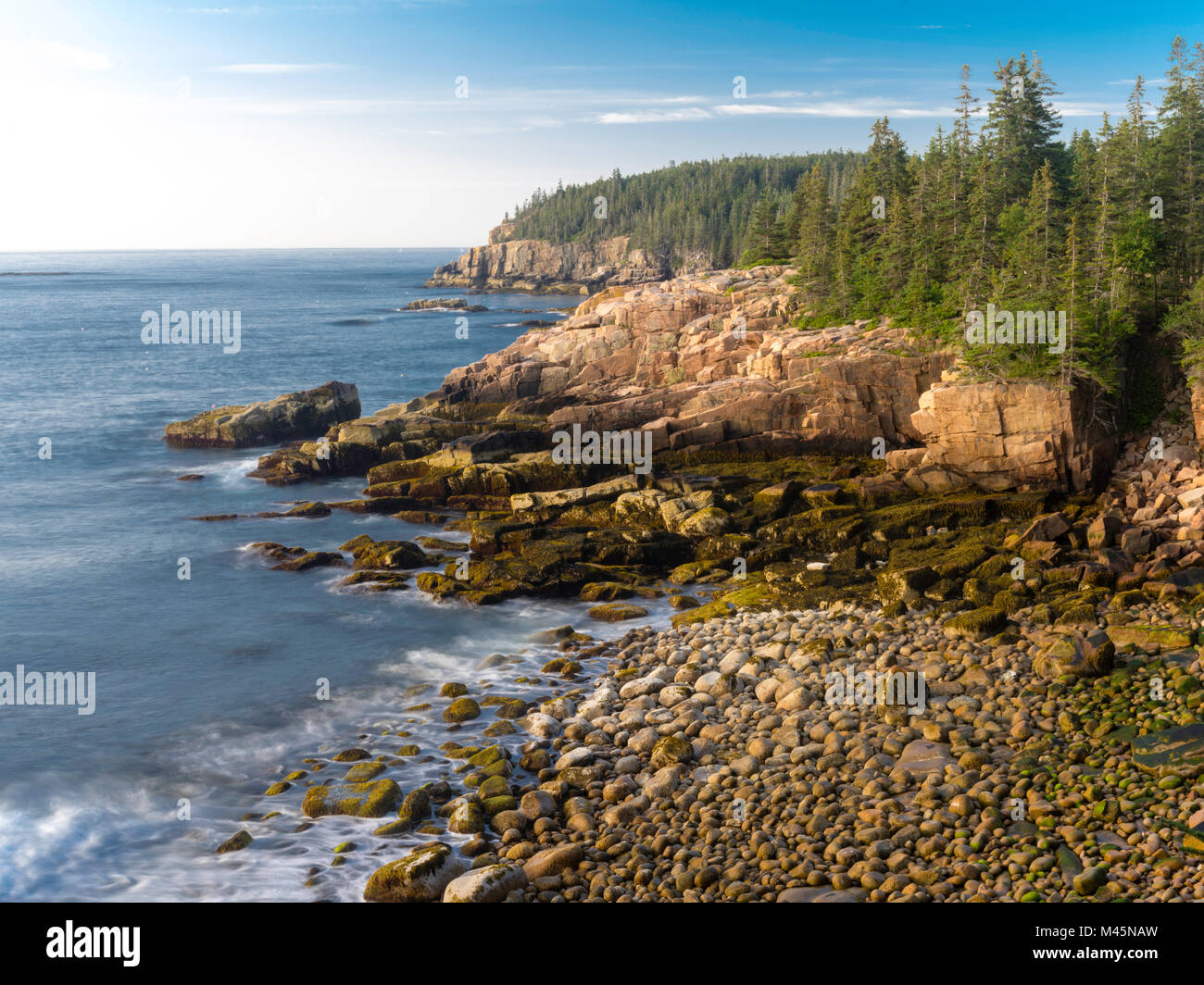 Morning view over Monument Cove and Otter Point, along the coast of ...