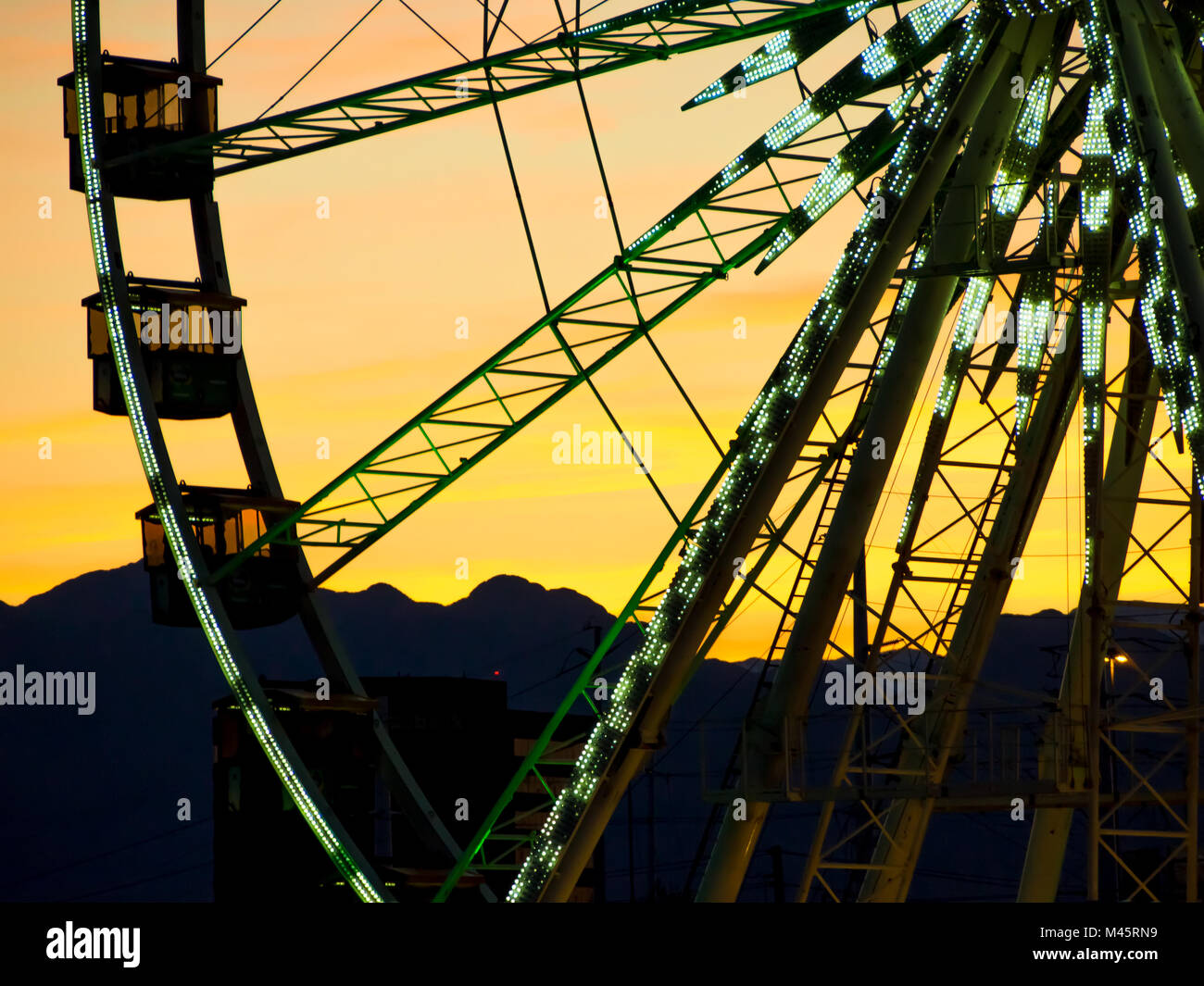 Detail And Silhouette of Ferris Wheel with Sun Set Stock Photo - Alamy