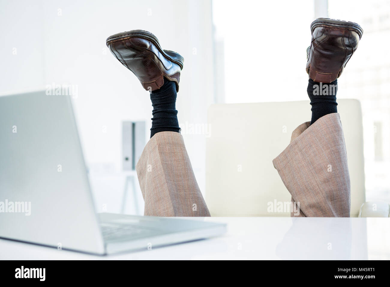 Feet up n desk hi-res stock photography and images - Alamy