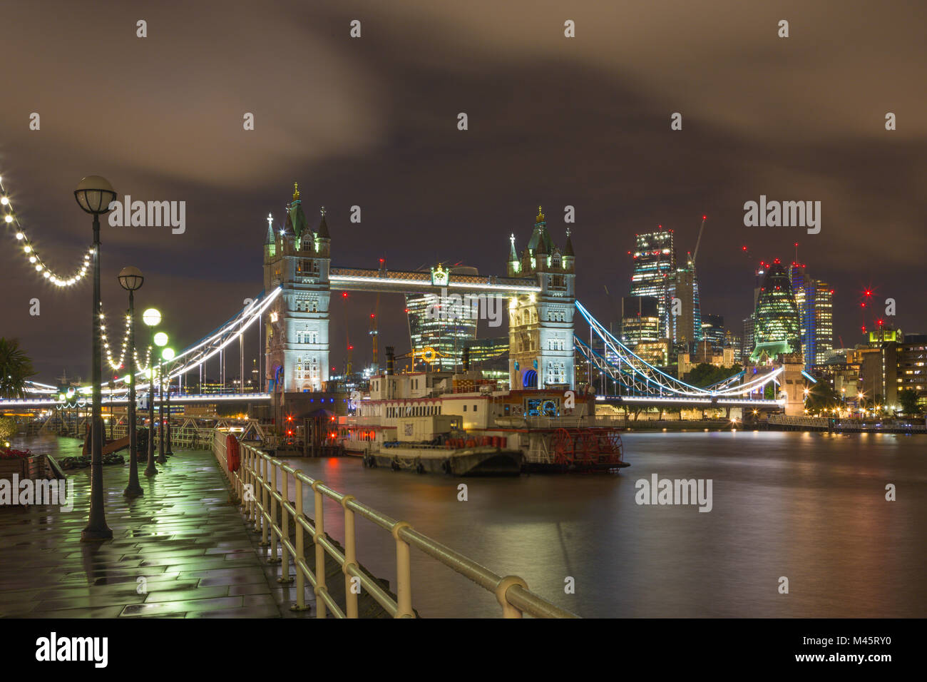London - The Tower Bride, promenade and skyscrapers at dusk light Stock ...