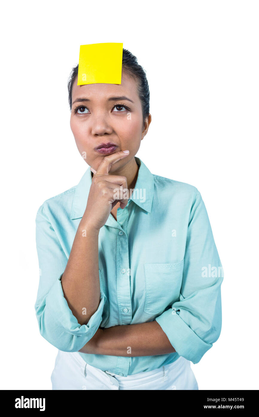 Businesswoman looking at the signe on her forehead Stock Photo - Alamy