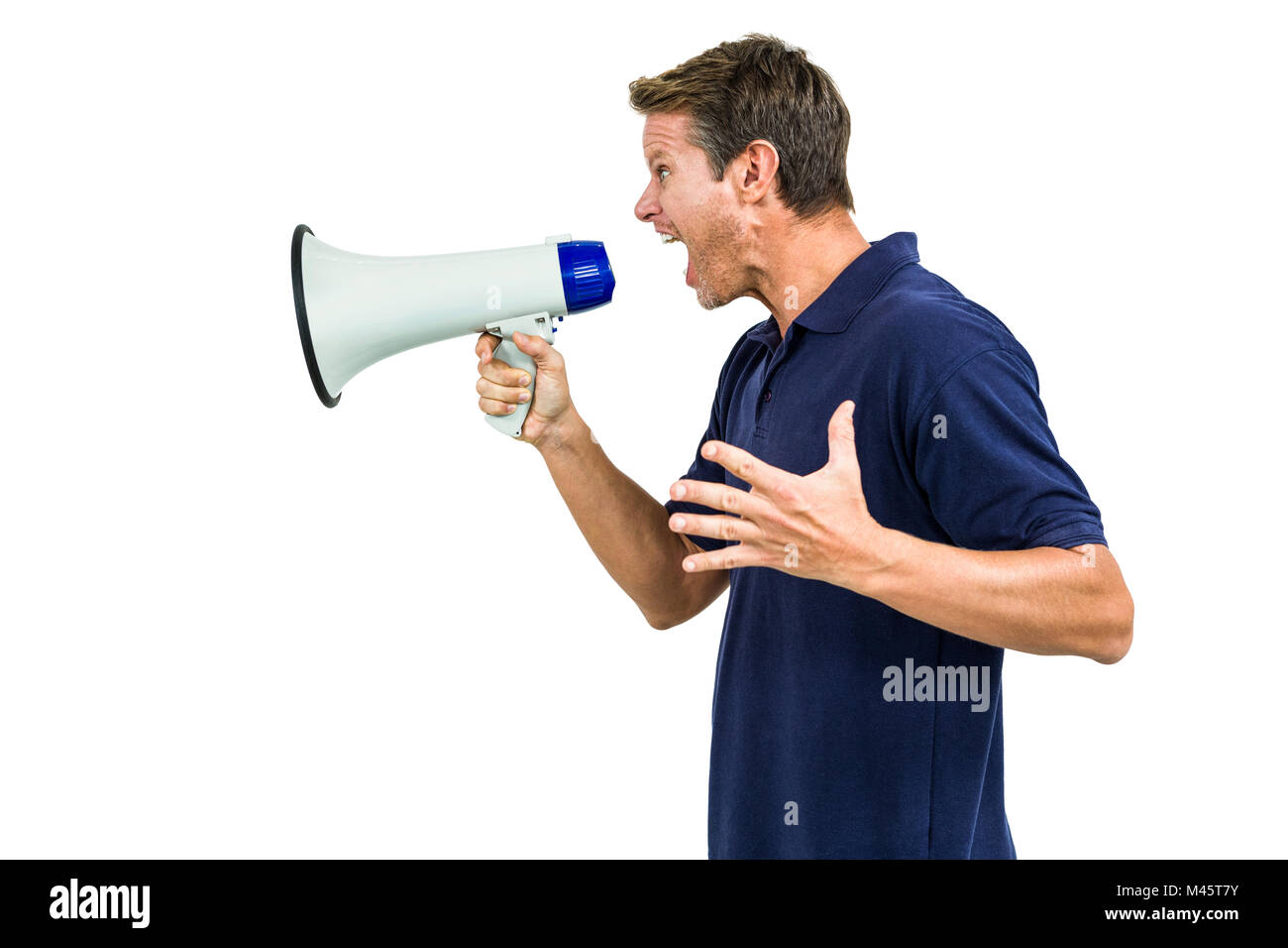 Side view of angry man shouting through megaphone Stock Photo - Alamy