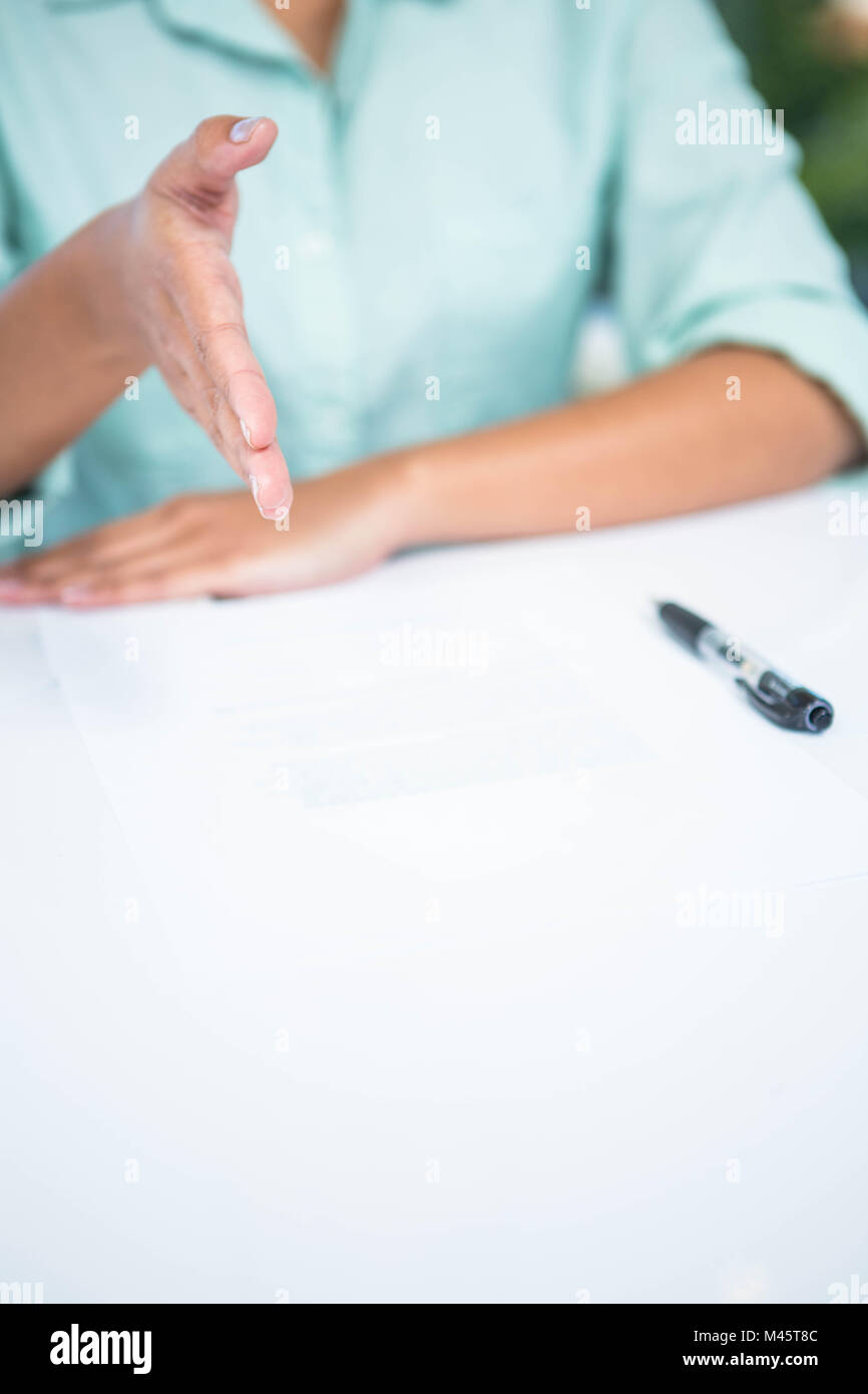 Mid section of a businesswoman ready to shake hand Stock Photo - Alamy