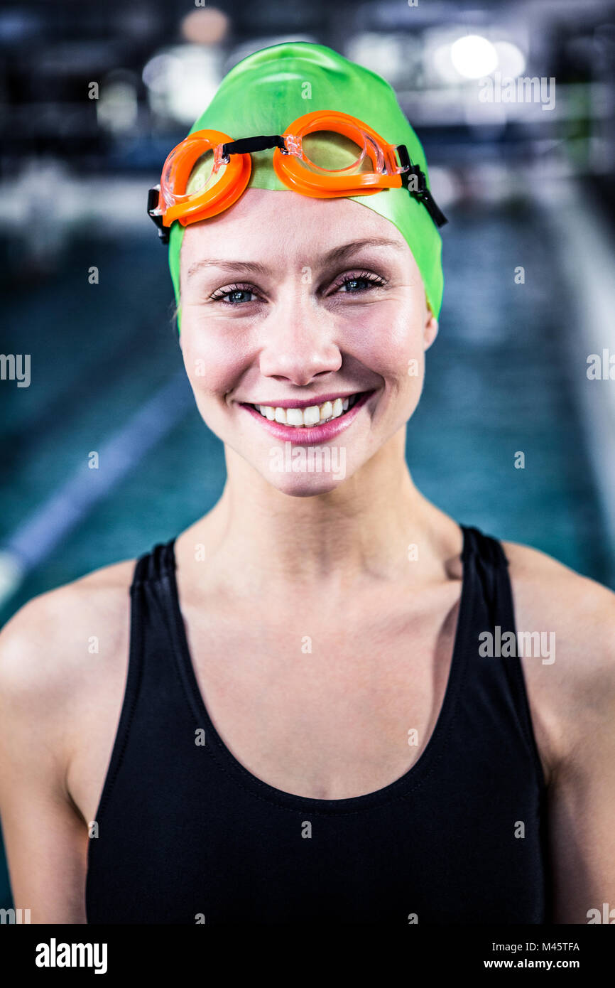 Portrait of a woman swimmer looking the camera Stock Photo - Alamy