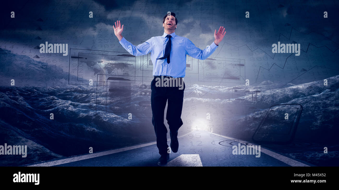 Composite image of happy businessman running with hands up Stock Photo ...
