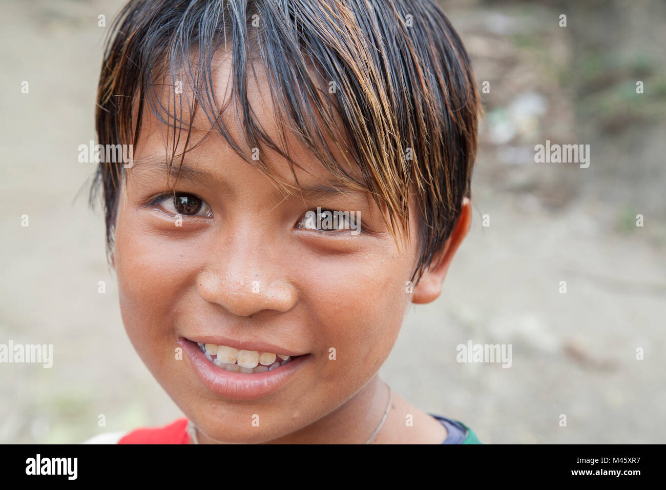 Portrait of a Young Burmese boy smiling outside Bagan Myanmar Stock ...