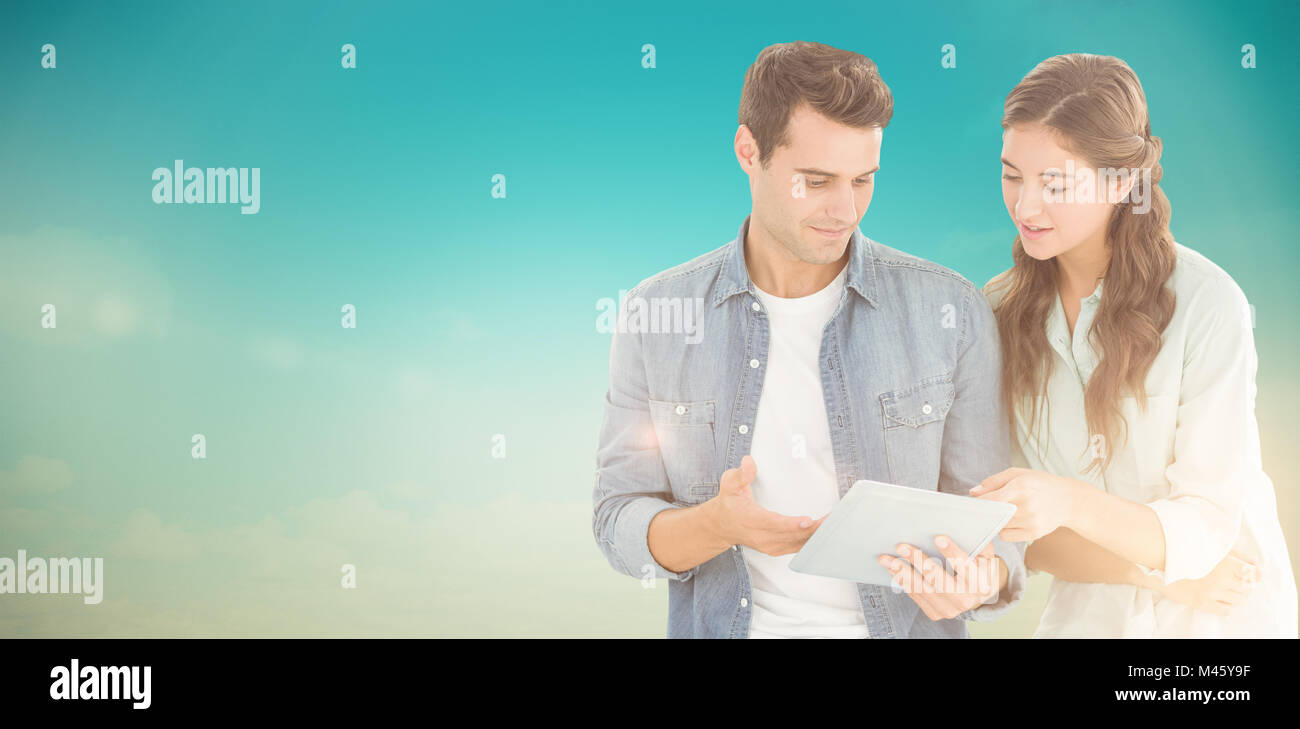 Composite image of business people with tablet Stock Photo - Alamy