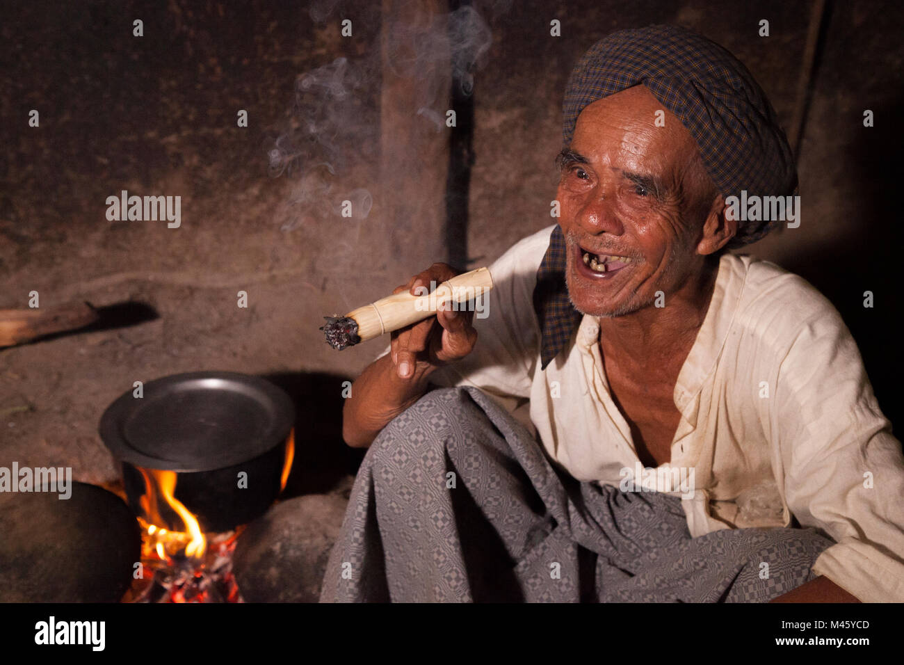 Asian man smoking cigar hi-res stock photography and images - Alamy