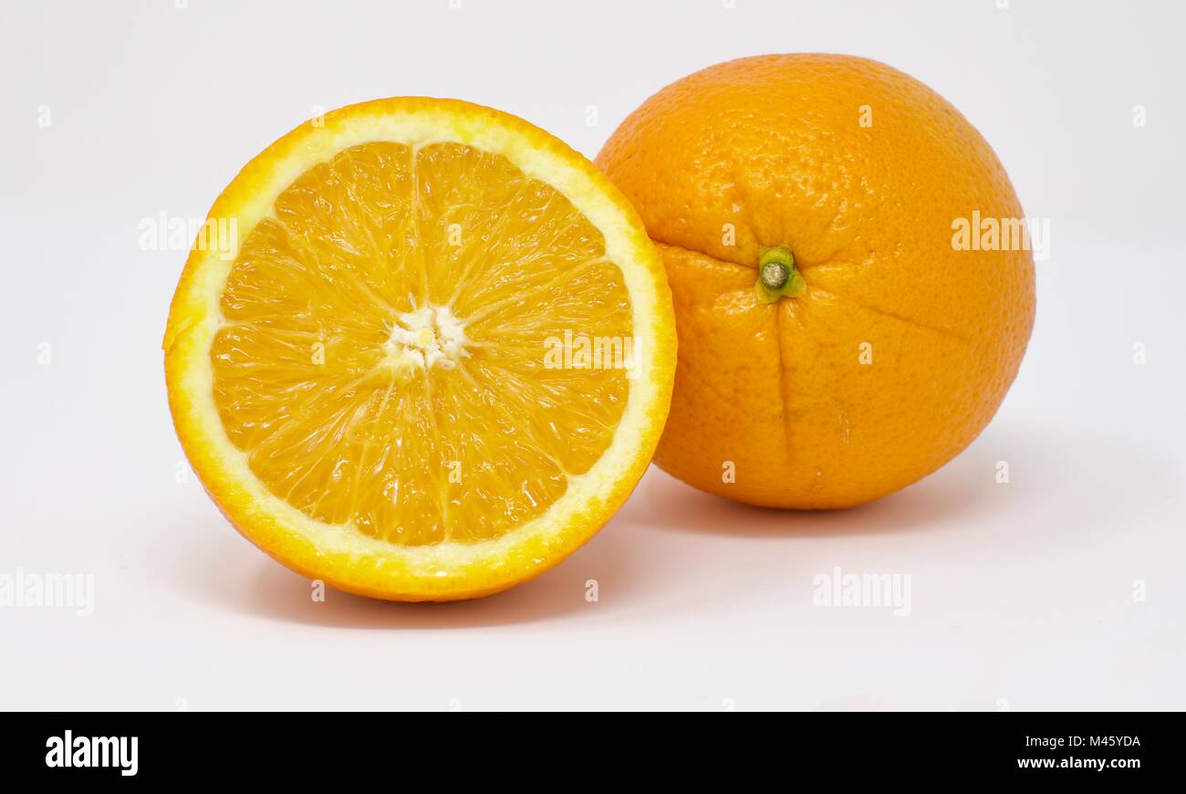 An orange, whole and split Stock Photo - Alamy