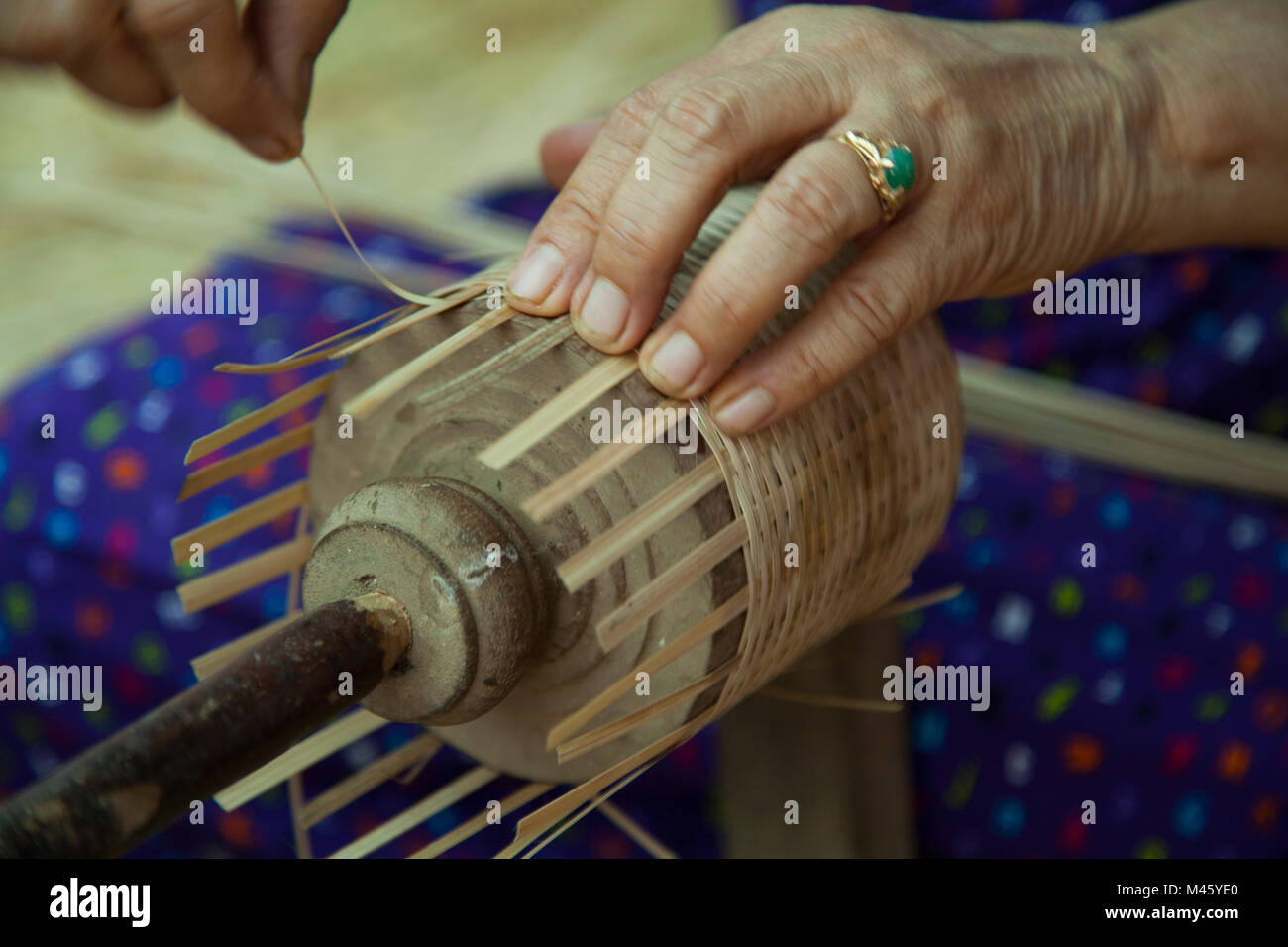 Burmese women working on traditional lacquer engravings in Bagan ...