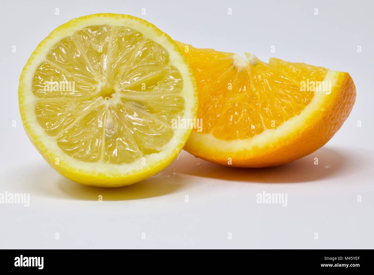 Half a Lemon (Citrus limon) and a quarter of a Orange (Citrus sinensis ...