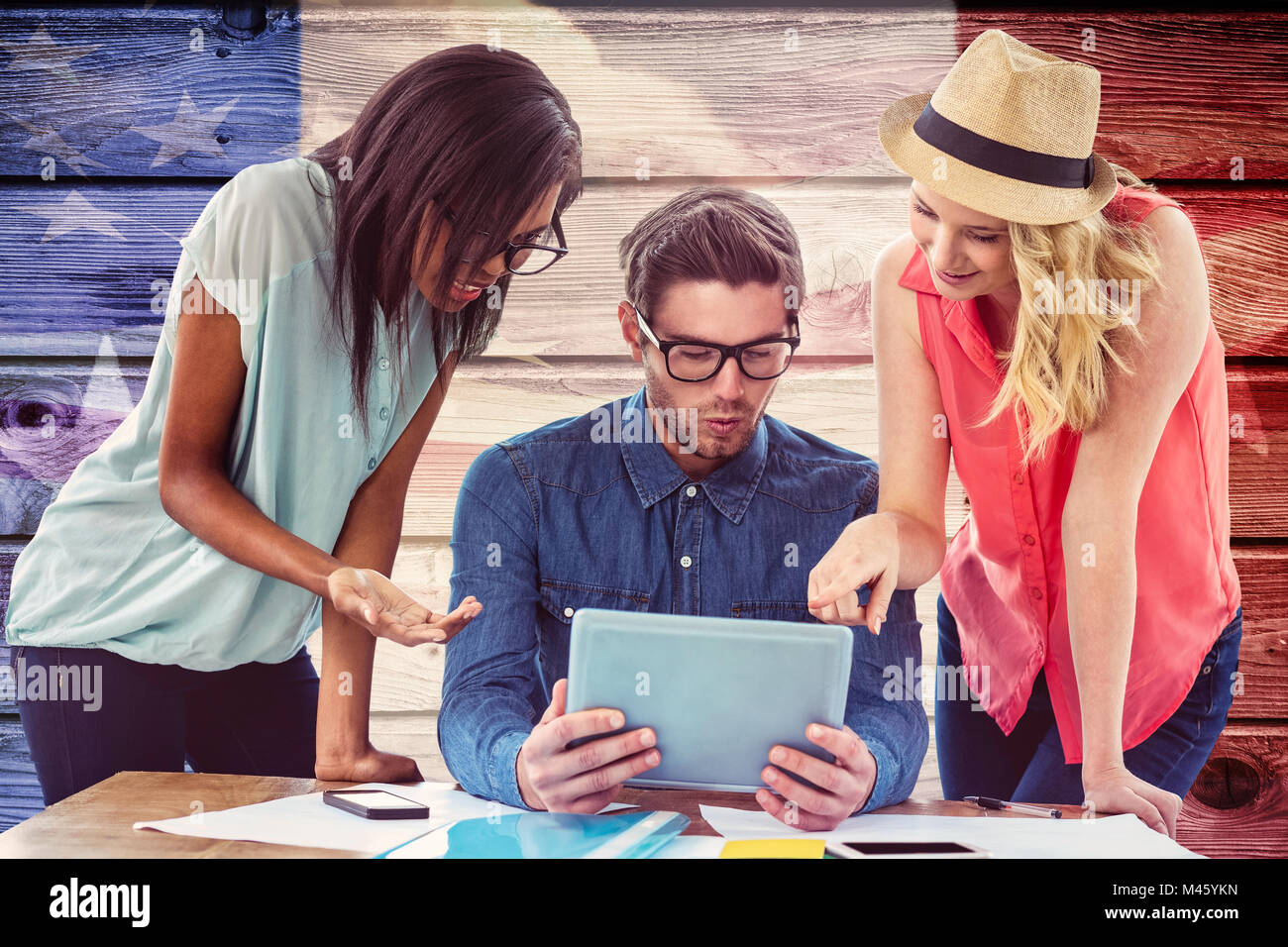 Composite image of creative business team working hard together Stock ...