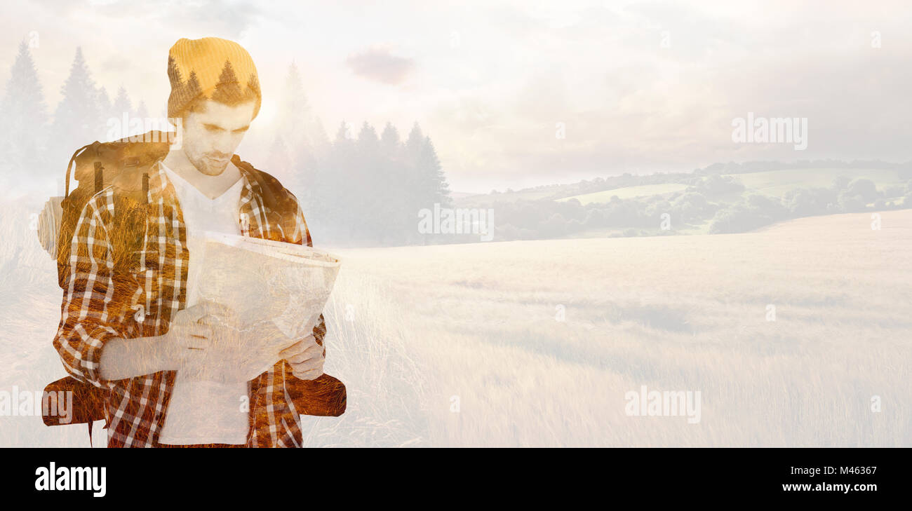 Young man looking down holding luggage hi-res stock photography and ...