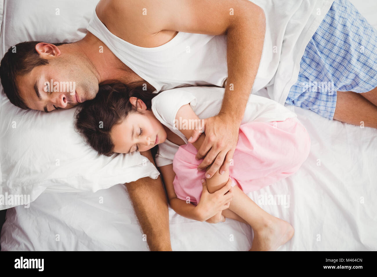 Father and daughter sleeping bed hi-res stock photography and images ...