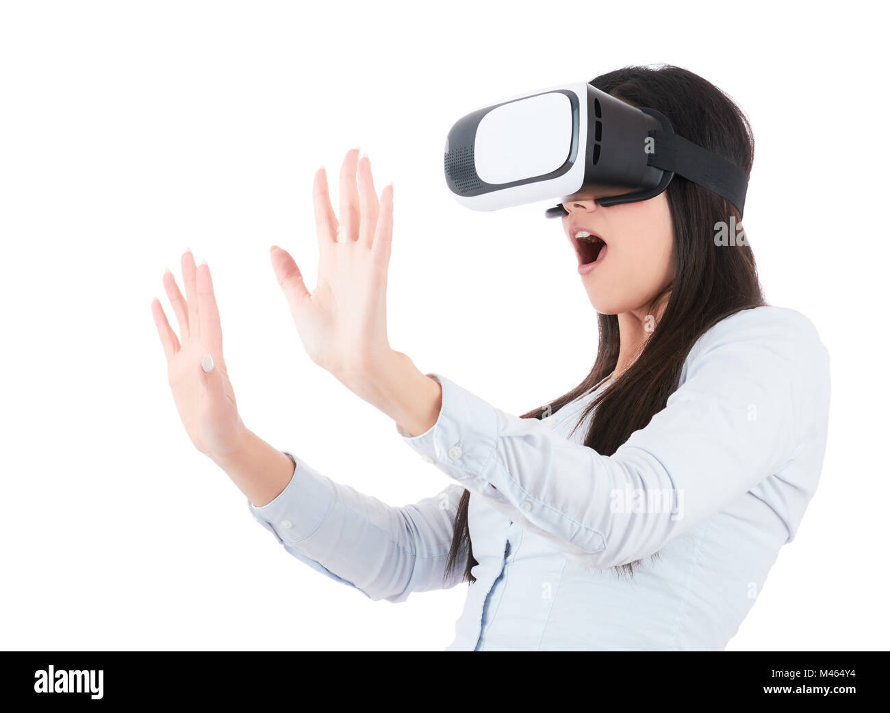 Young woman is using VR headset isolated on white background Stock ...
