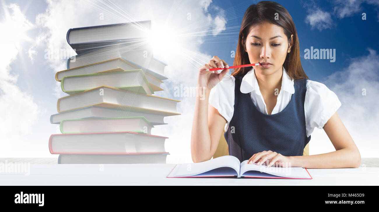 Composite image of thoughtful businesswoman reading Stock Photo - Alamy