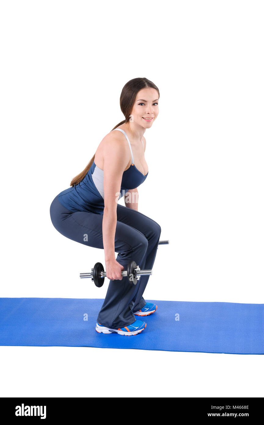 Standing Dumbbell Squats workout Stock Photo - Alamy