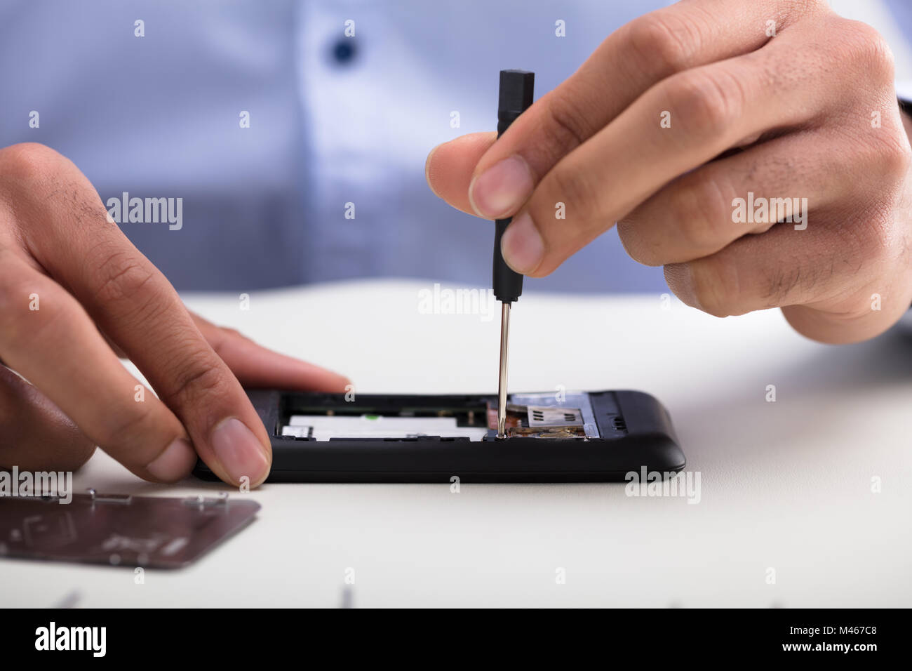 Phone fixing hi-res stock photography and images - Alamy