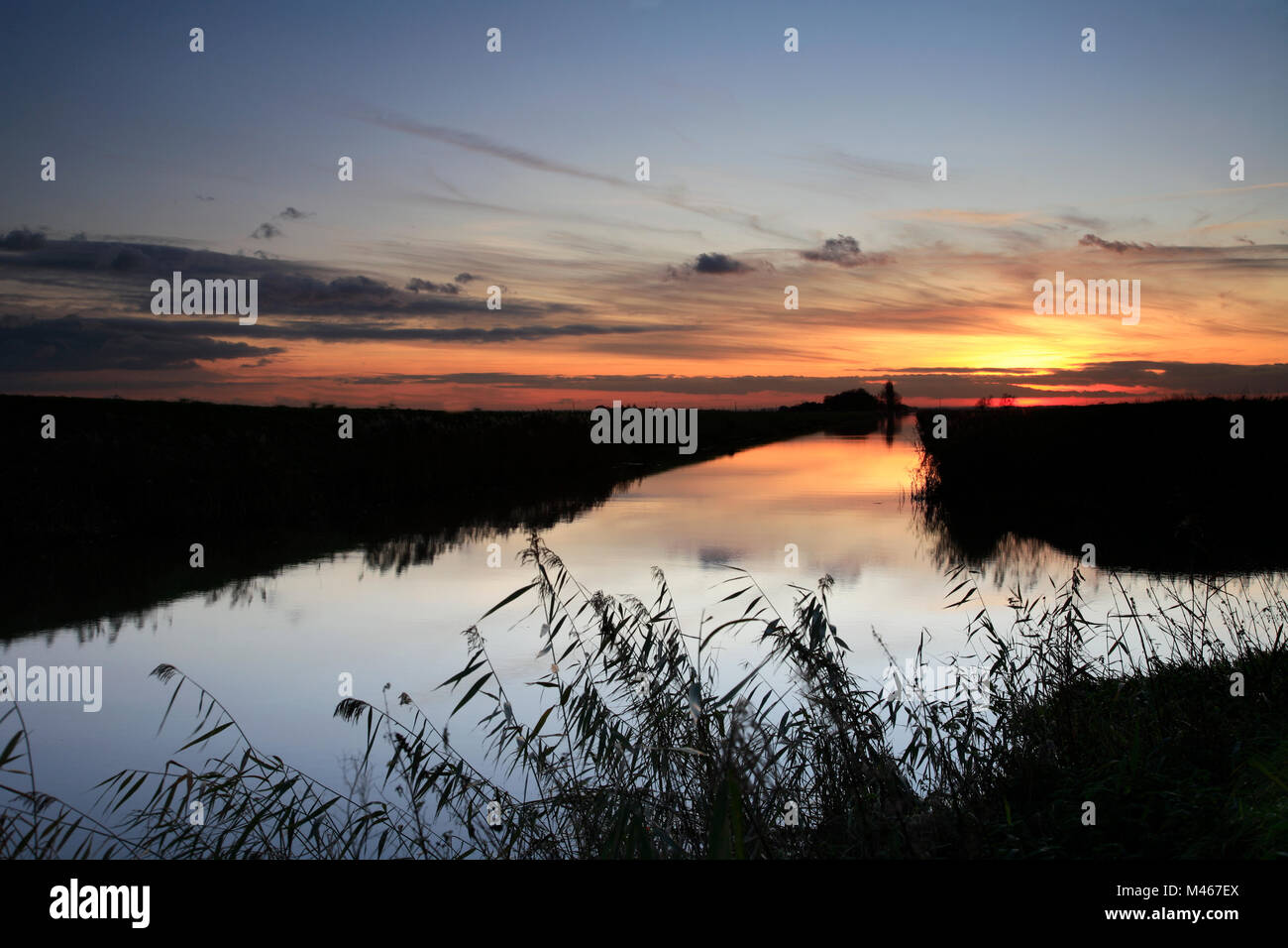 Summer sunset over a Fenland Drain; near March town; Cambridgeshire ...