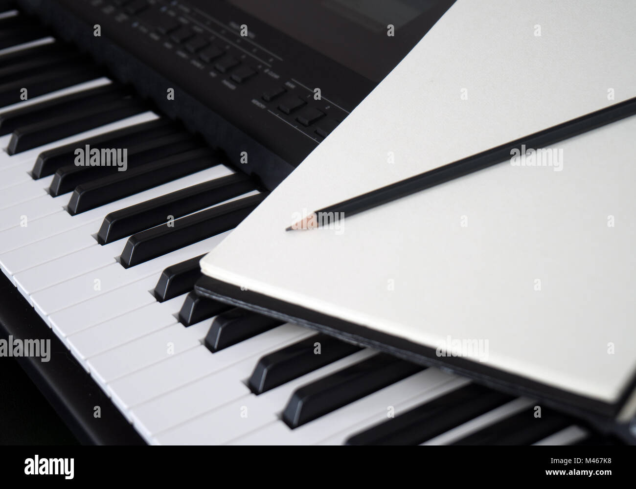 Piano keyboard, pen and sheet. Concept of composing song Stock Photo ...