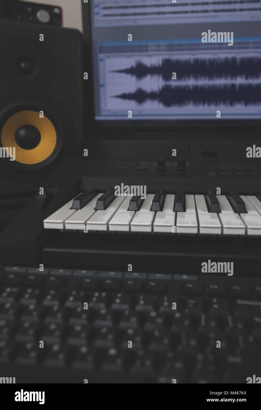 Home recording studio with professional monitors and midi keyboard ...