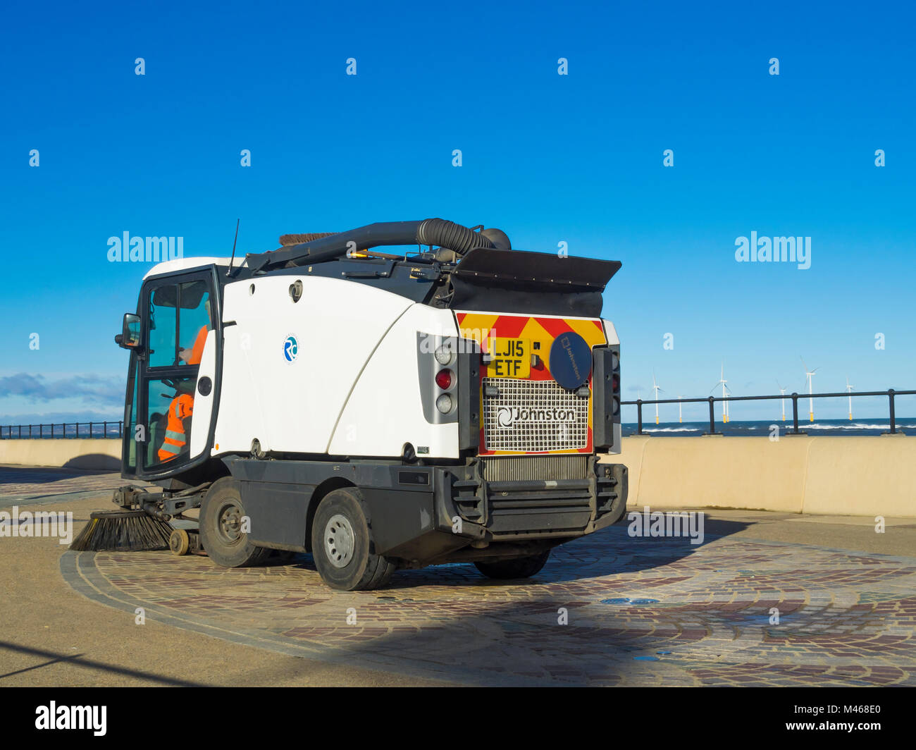 Johnston sub-compact single seat Street Sweeping machine at work ... Johnston sub-compact single seat Street Sweeping machine at work ...