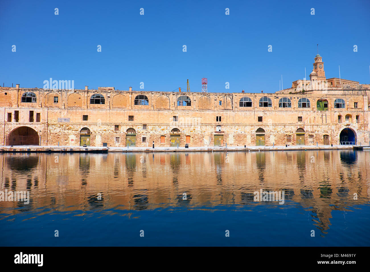 The old dock building at Bormla (Cospicua) waterfront. Malta Stock ...