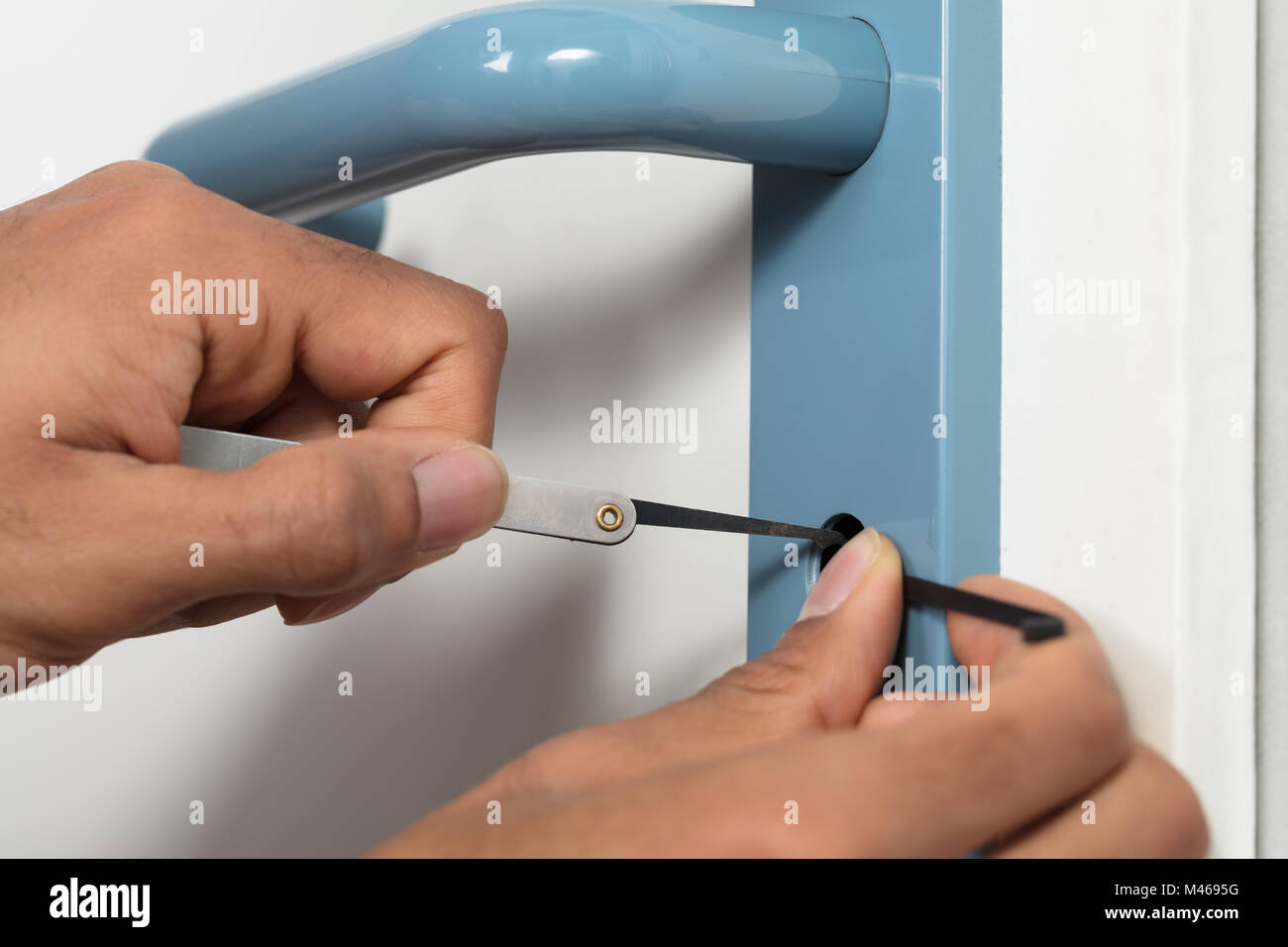 Close-up Of A Person's Hand Opening Door Lock With Lockpicker Stock ...